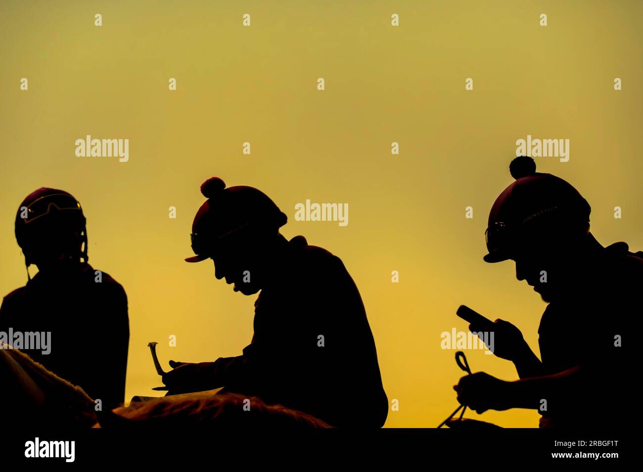 Images of horses and their riders at a horse race Stock Photo - Alamy