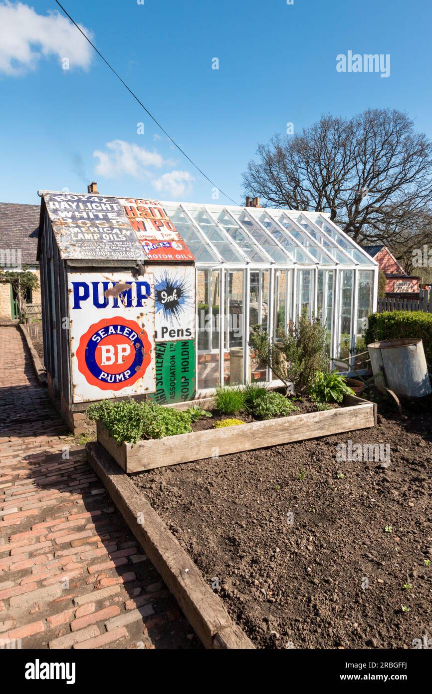 Greehouse in a garden, UK Stock Photo - Alamy