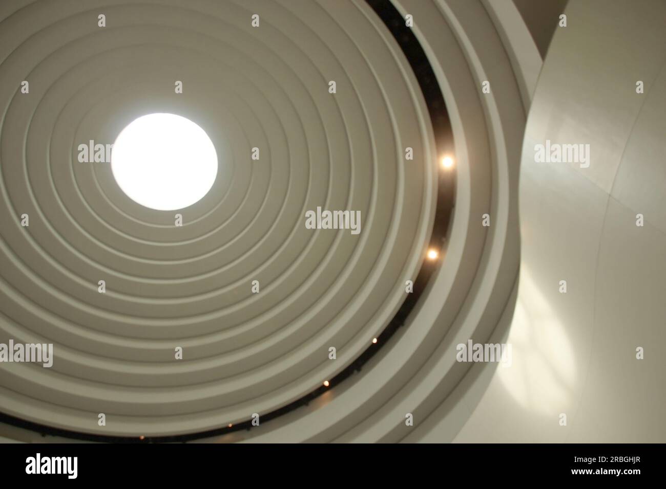 Illuminated circular skylight seen from below, concentric circles ...