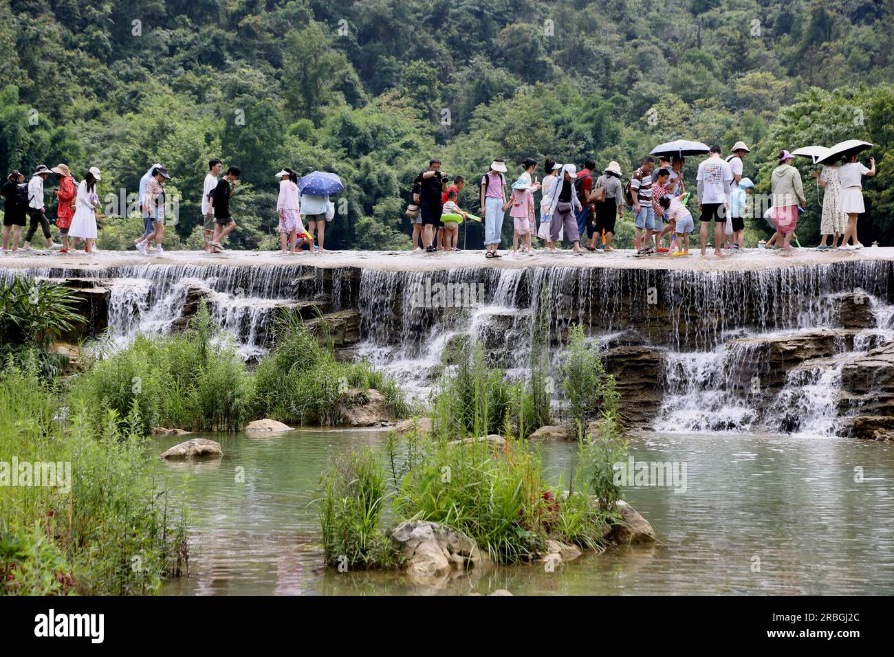 Anshun, China. 10th July, 2023. ANSHUN, CHINA - JULY 9, 2023 - Tourists ...