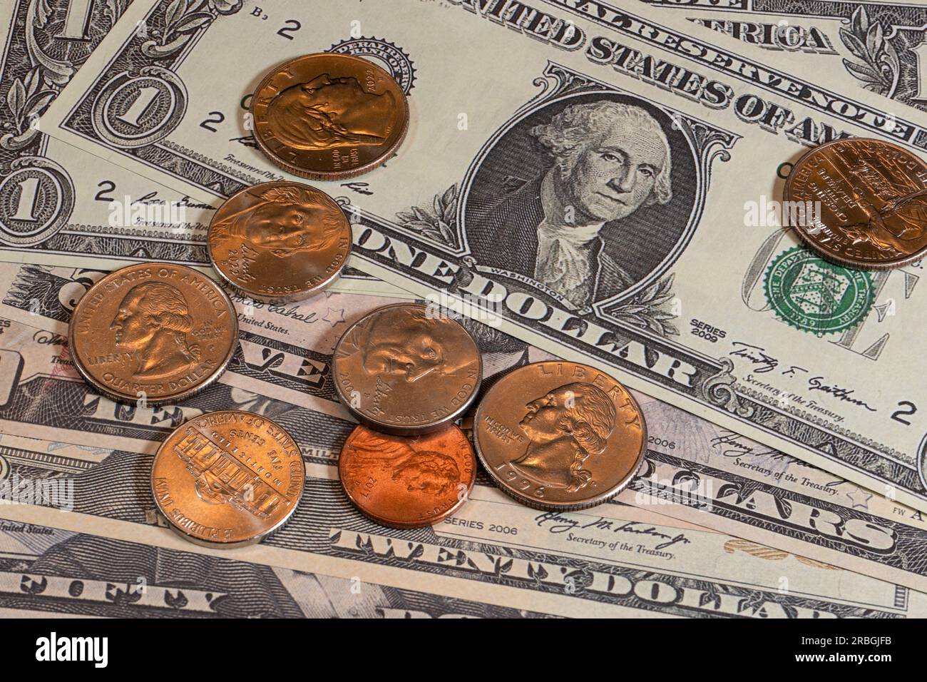 US coins and on US cuurency background. top view. financial and banking ...