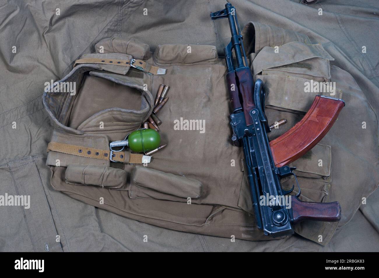 Kalashnikov AK 47 assault rifle with primitive russian body armor and ...