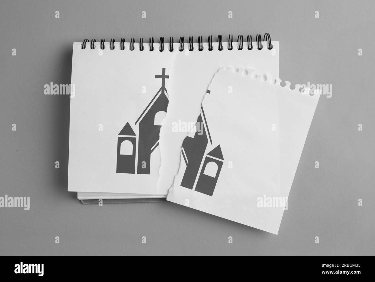 Atheism as religious position. Torn paper with illustration of church ...