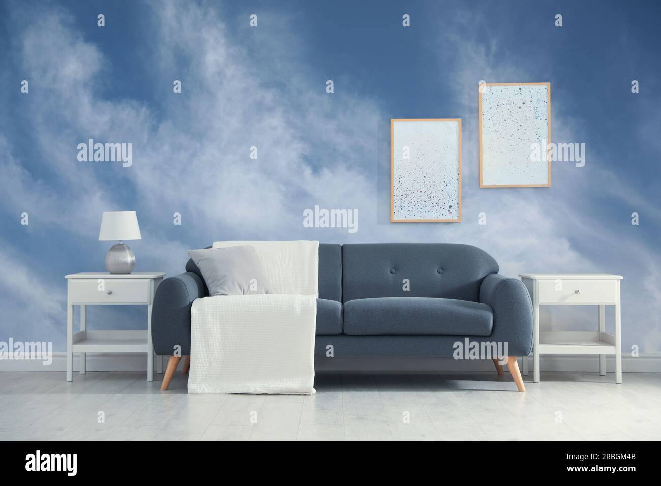 Blue sky with clouds on wallpaper in furnished room. Beautiful interior ...