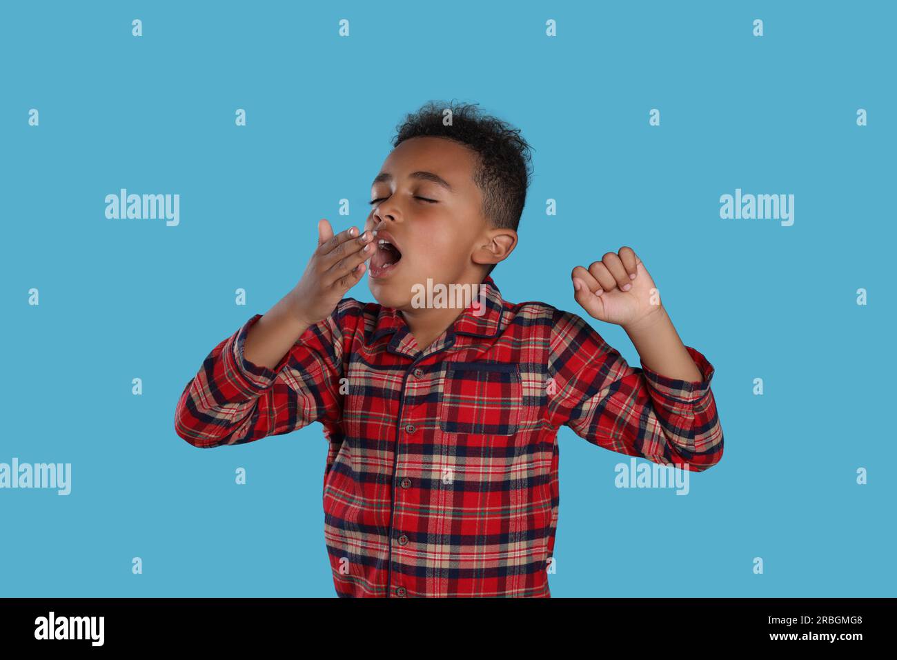 Boy yawning and stretching hi-res stock photography and images - Alamy