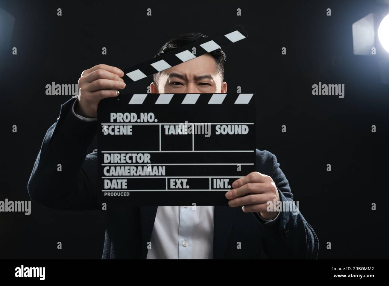 Asian actor with clapperboard on stage. Film industry Stock Photo - Alamy