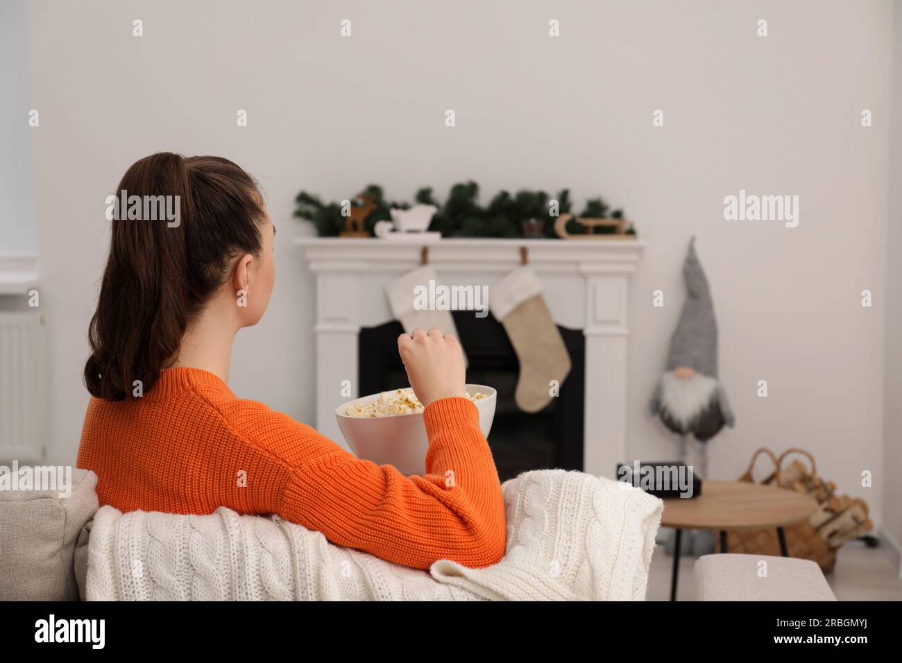 Woman with popcorn at home. Watching movie via video projector Stock ...