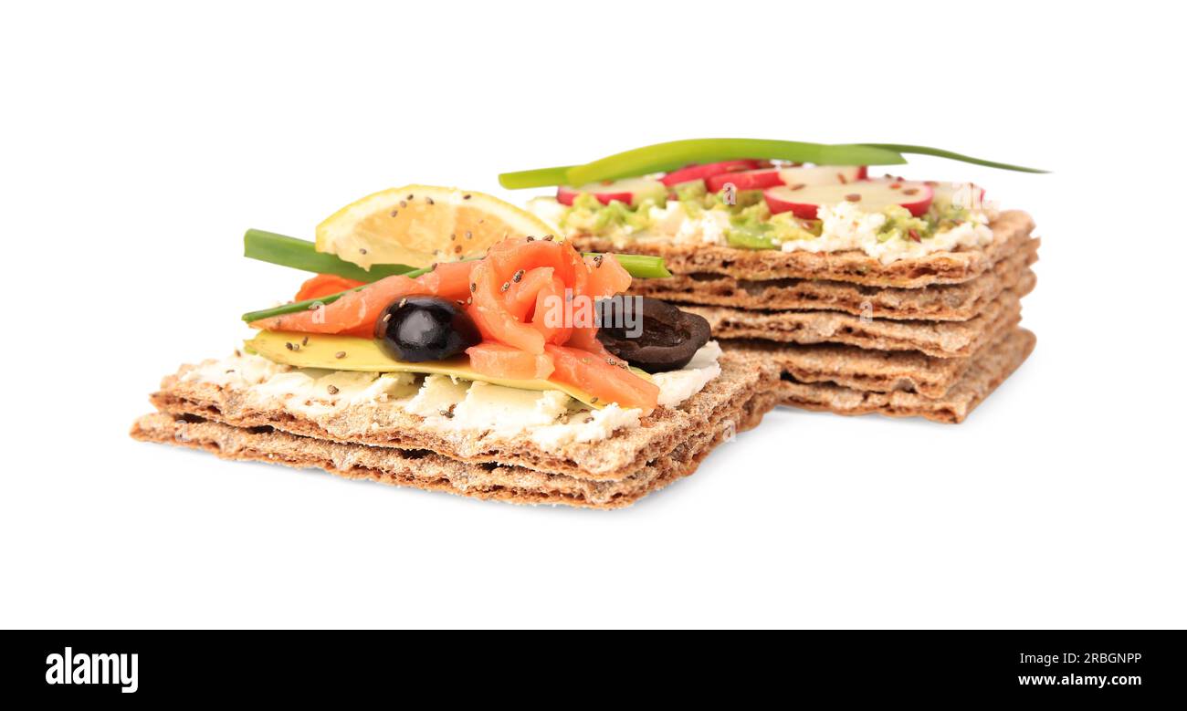 Fresh crunchy crispbreads with cream cheese, salmon, olives, lemon ...