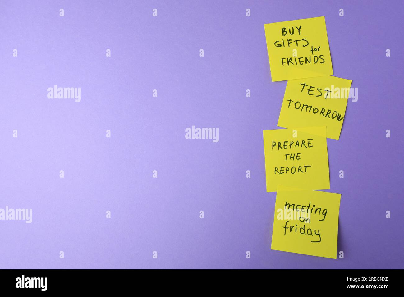 Many different reminder notes on violet background, flat lay. Space for ...