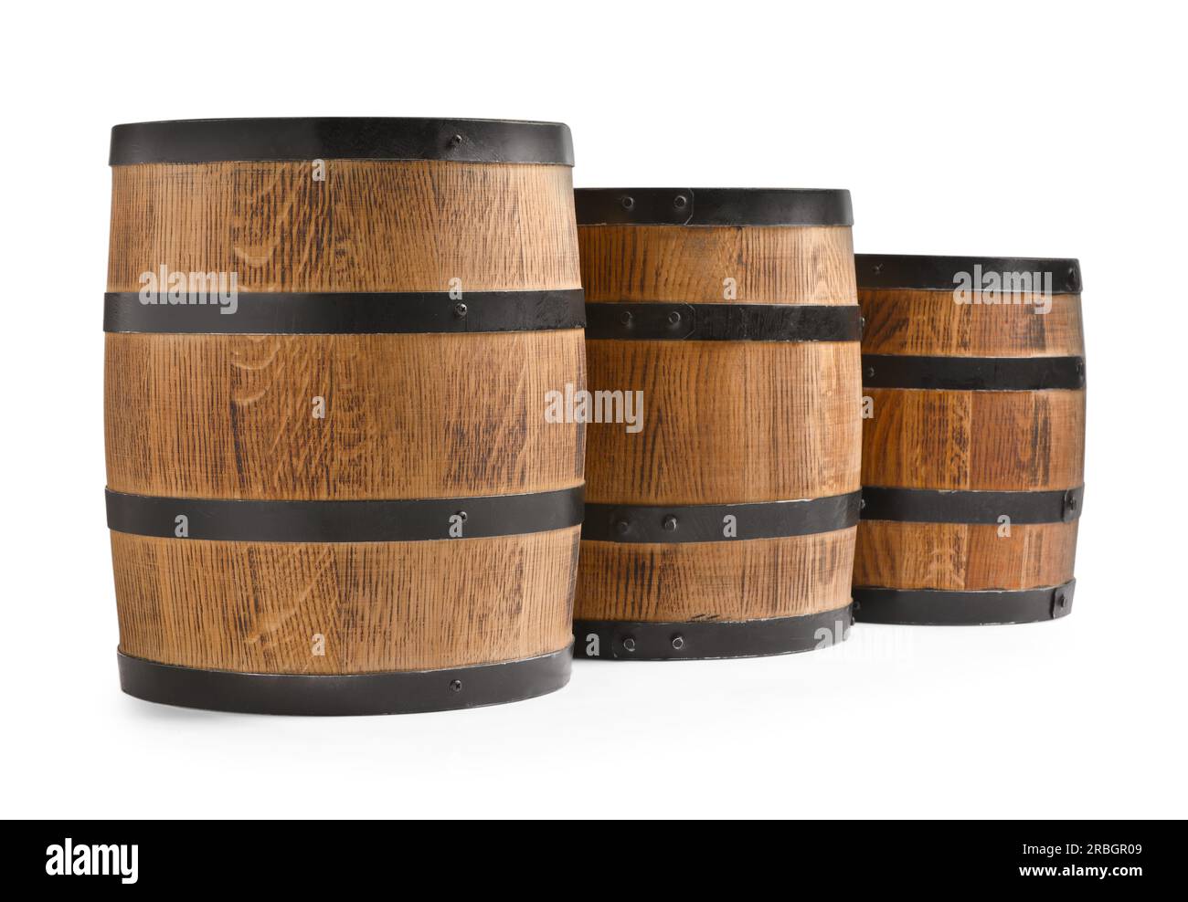 Three traditional wooden barrels on white background Stock Photo - Alamy