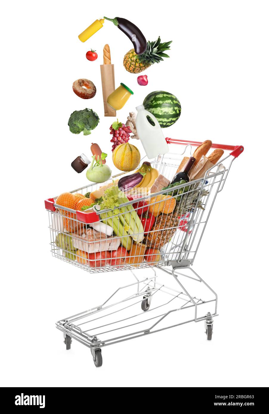 Market assortment. Different products falling into shopping cart on ...