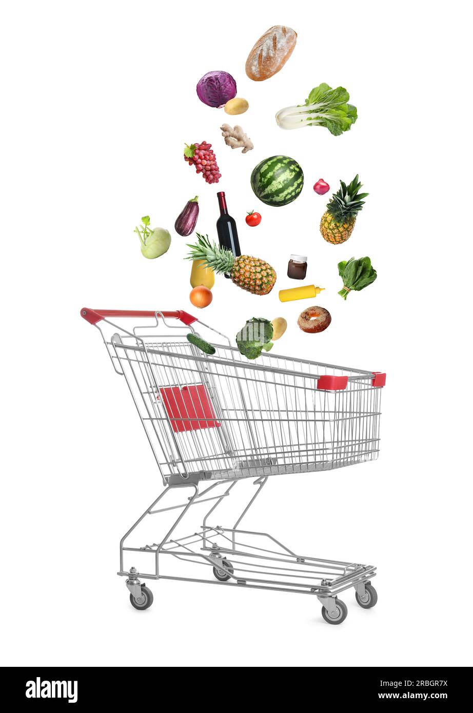 Market assortment. Different products falling into shopping cart on ...