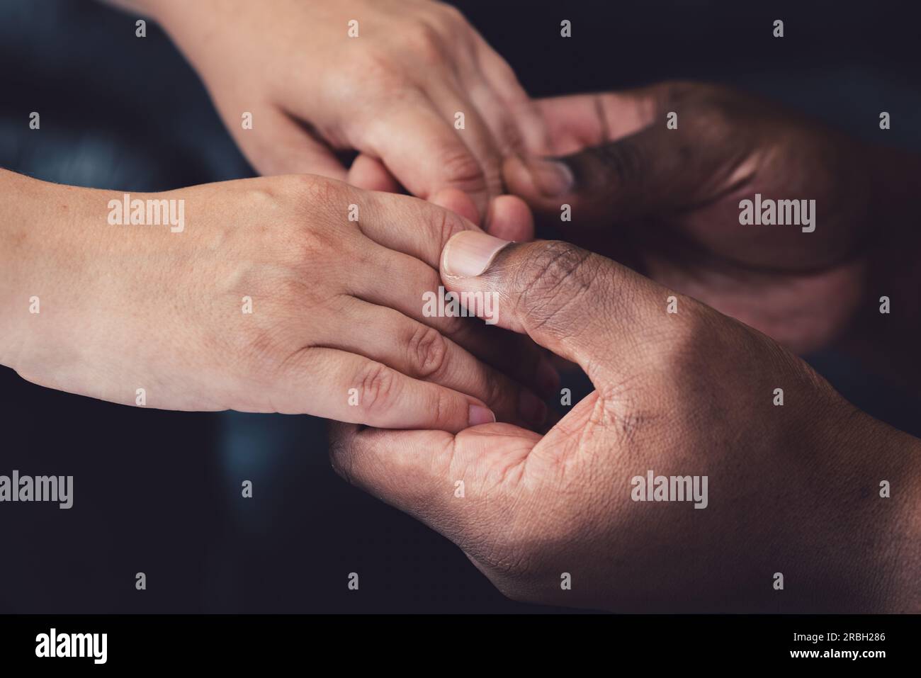 two hands man and woman showing act of support togetherness or kindness ...