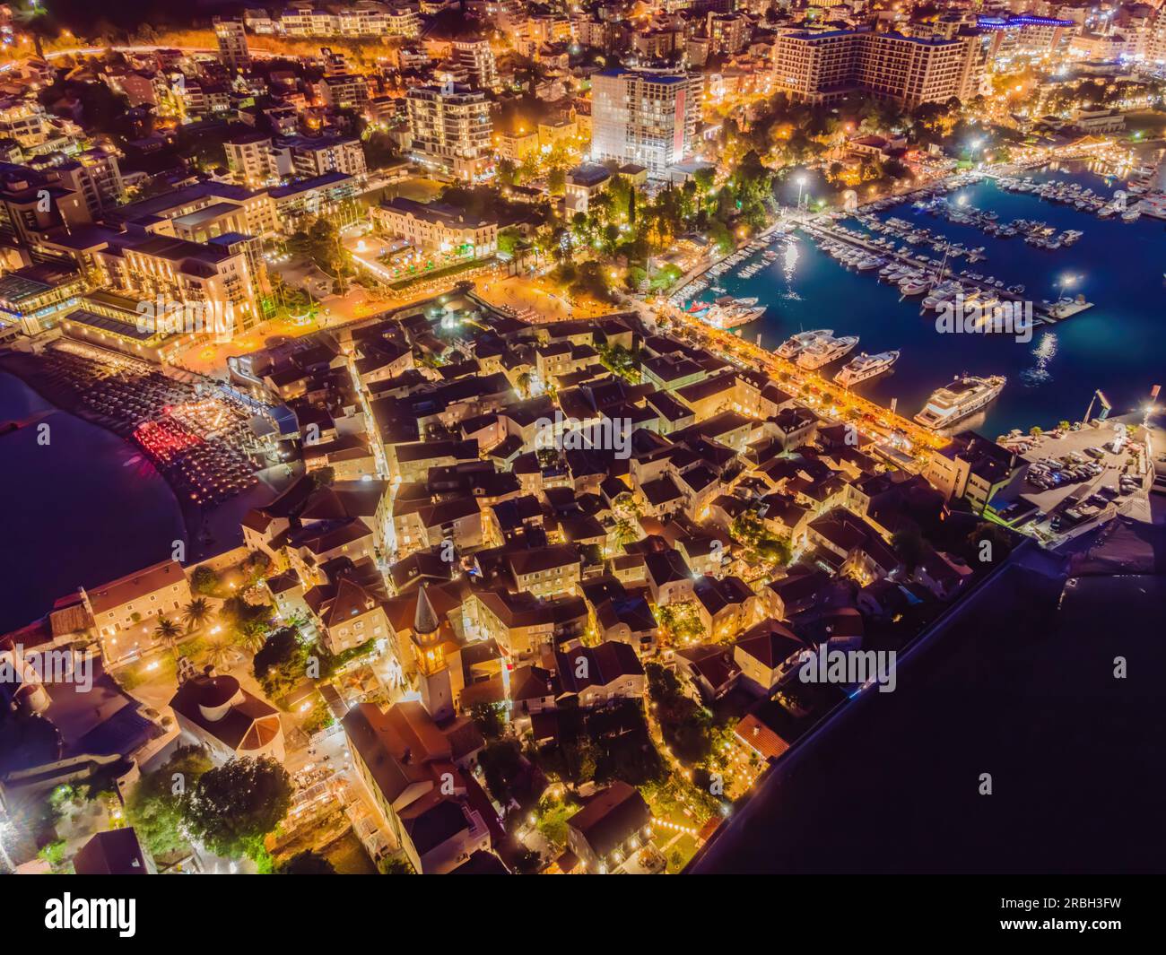 Budva city lights from Montenegro seen from above. Night view. Drone ...
