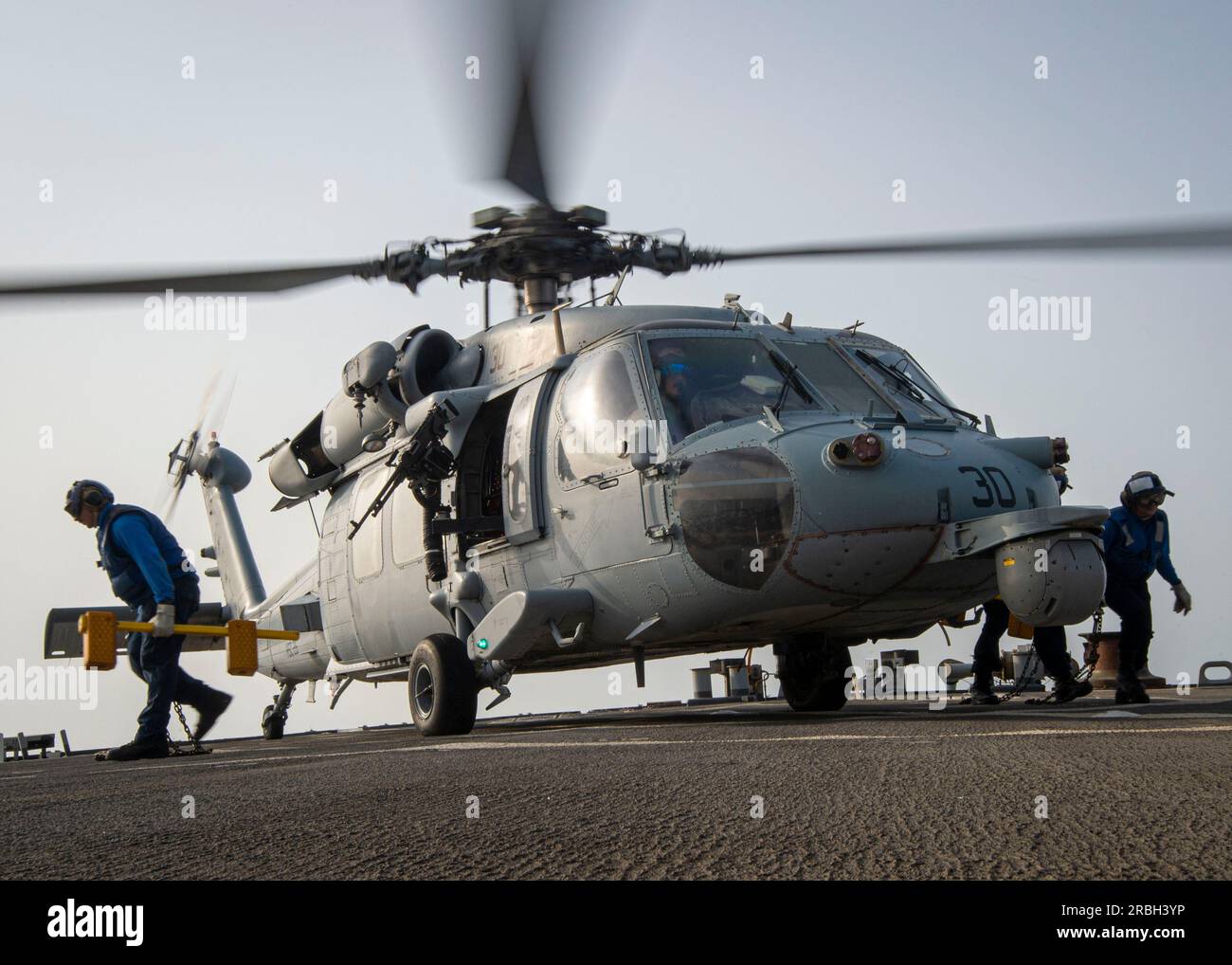 230706-N-NH267-1127 GULF OF OMAN (July 6, 2023) Sailors remove chocks ...