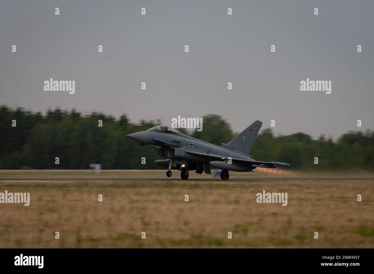 A German Eurofighter Typhoon takes off from the flight line at Tactical ...