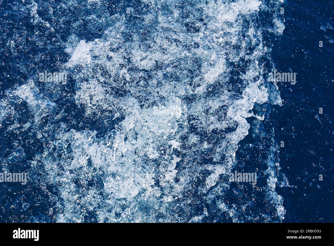 Abstract blue sea water with white waves. Blue sea texture with waves ...