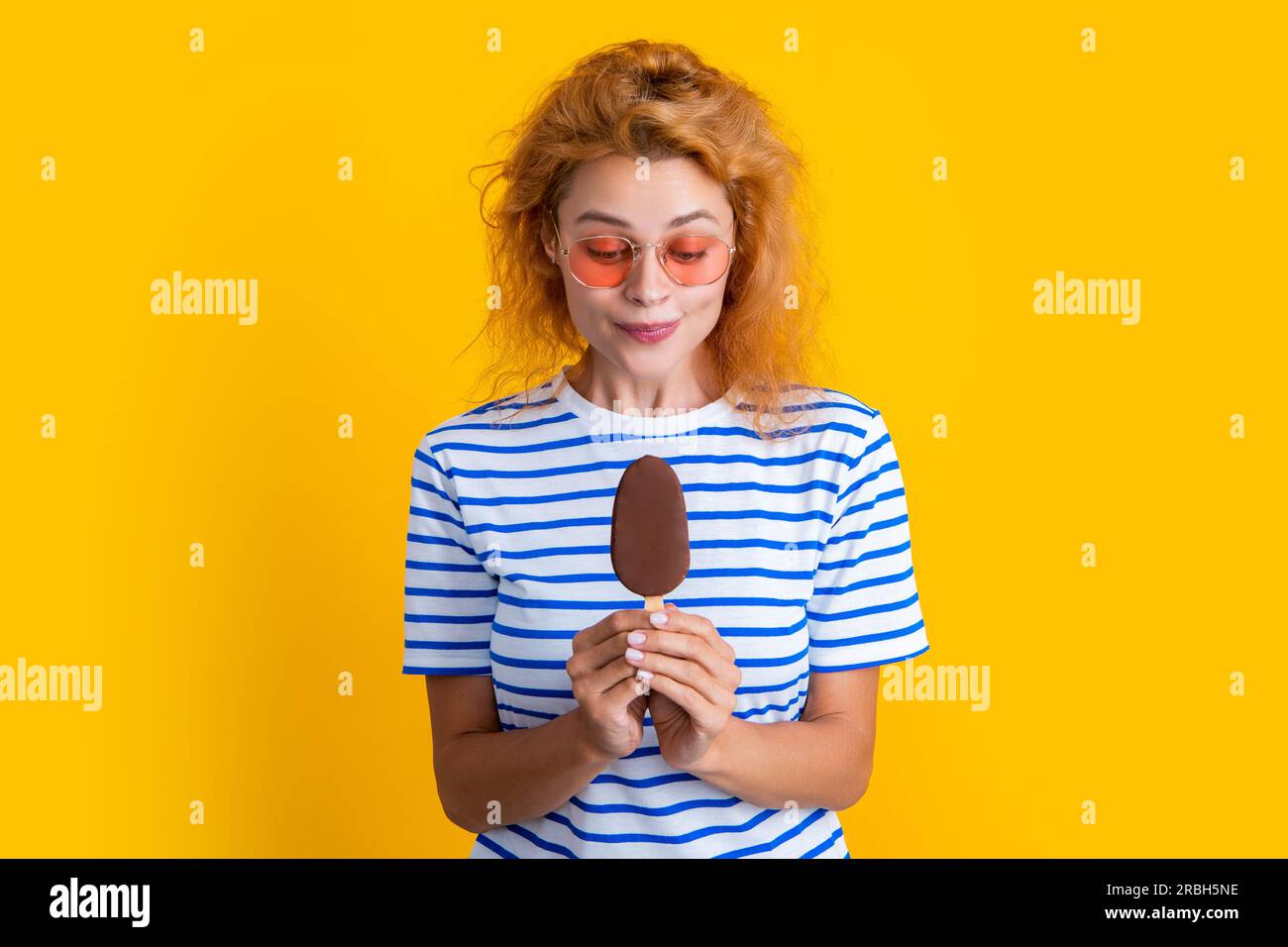caucasian girl with icelolly ice cream on background. photo of girl ...