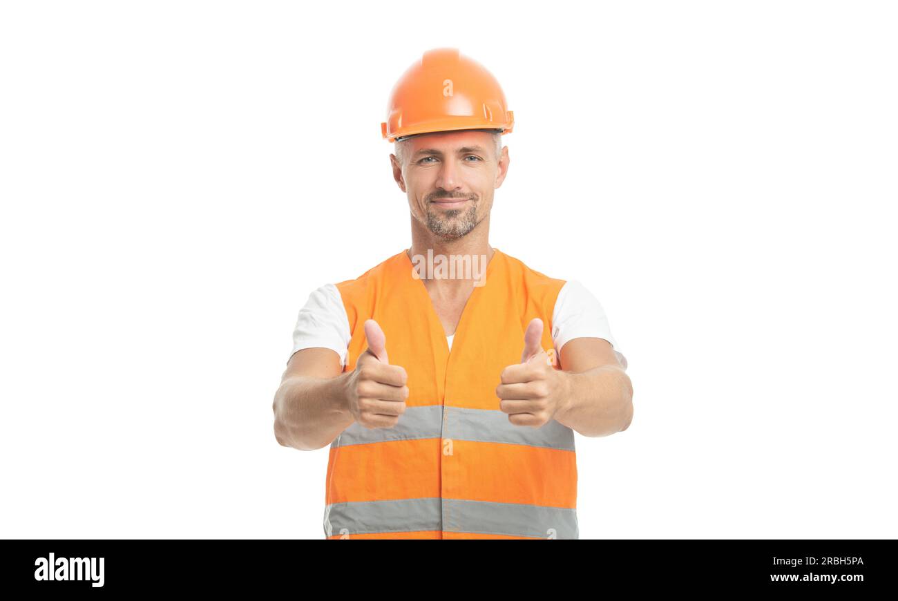 man engineer in white studio, thumb up. man engineer on background ...