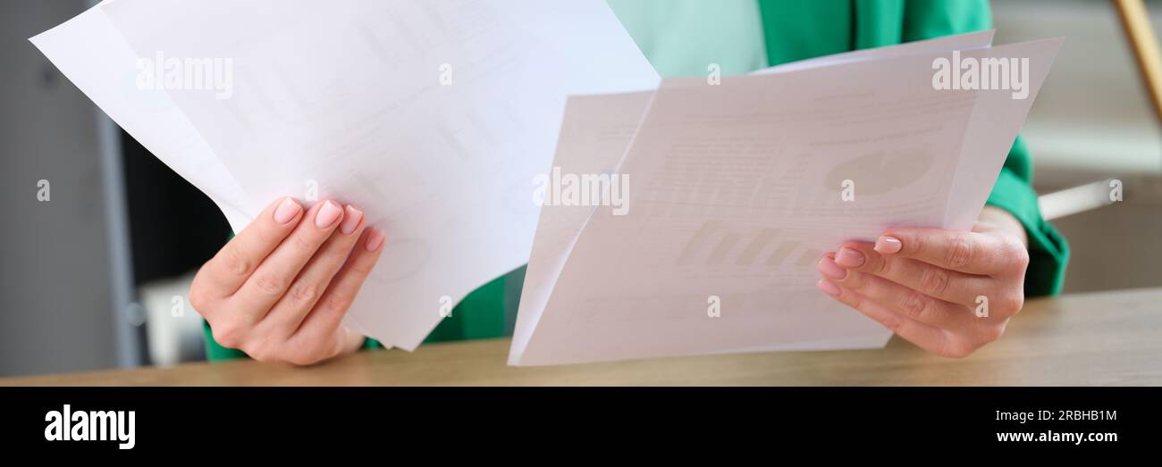 Woman holding financial documents charts hi-res stock photography and ...