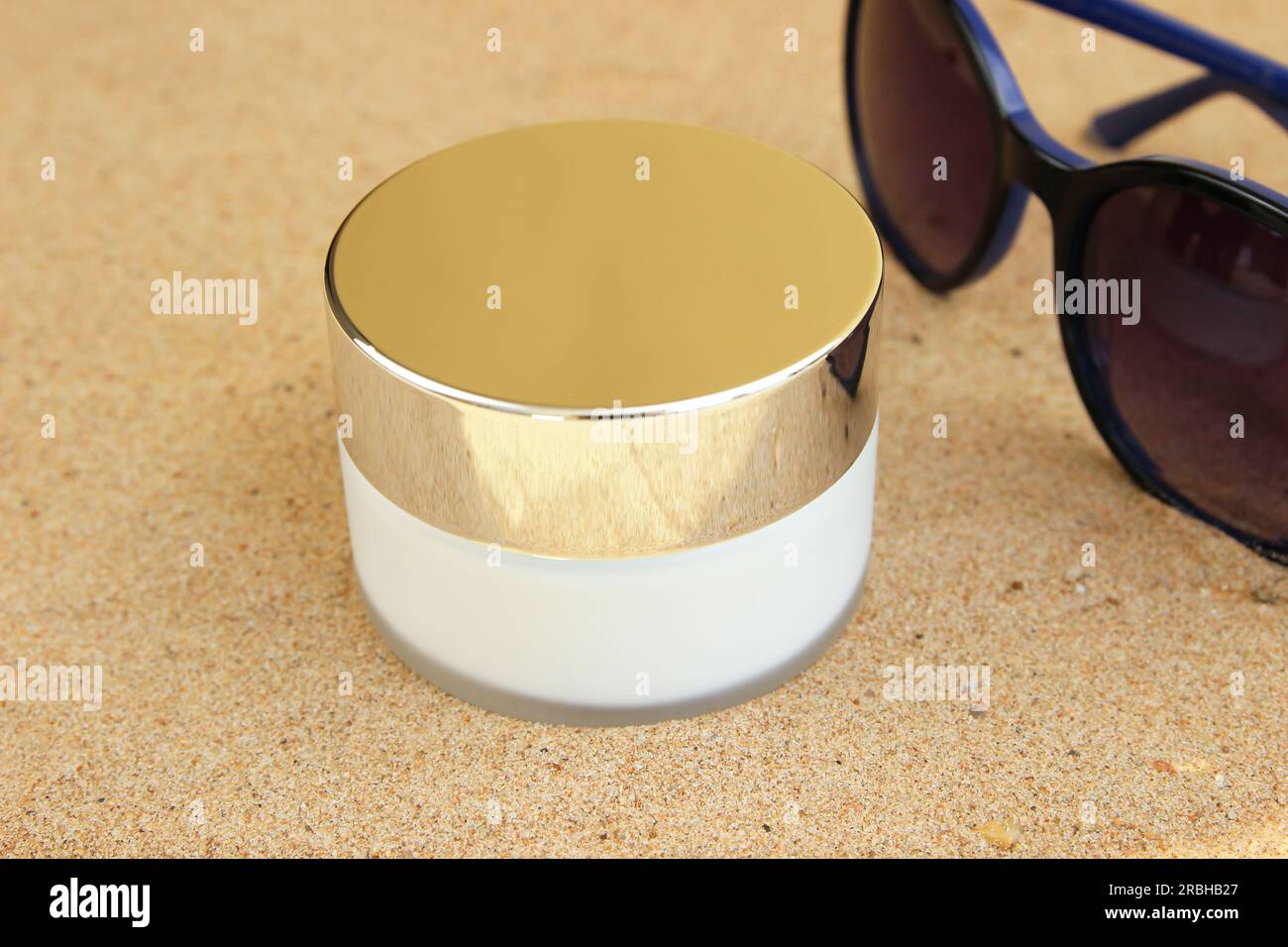 Unbranded Cosmetic glass jar with white moisturizer and metal cap and ...