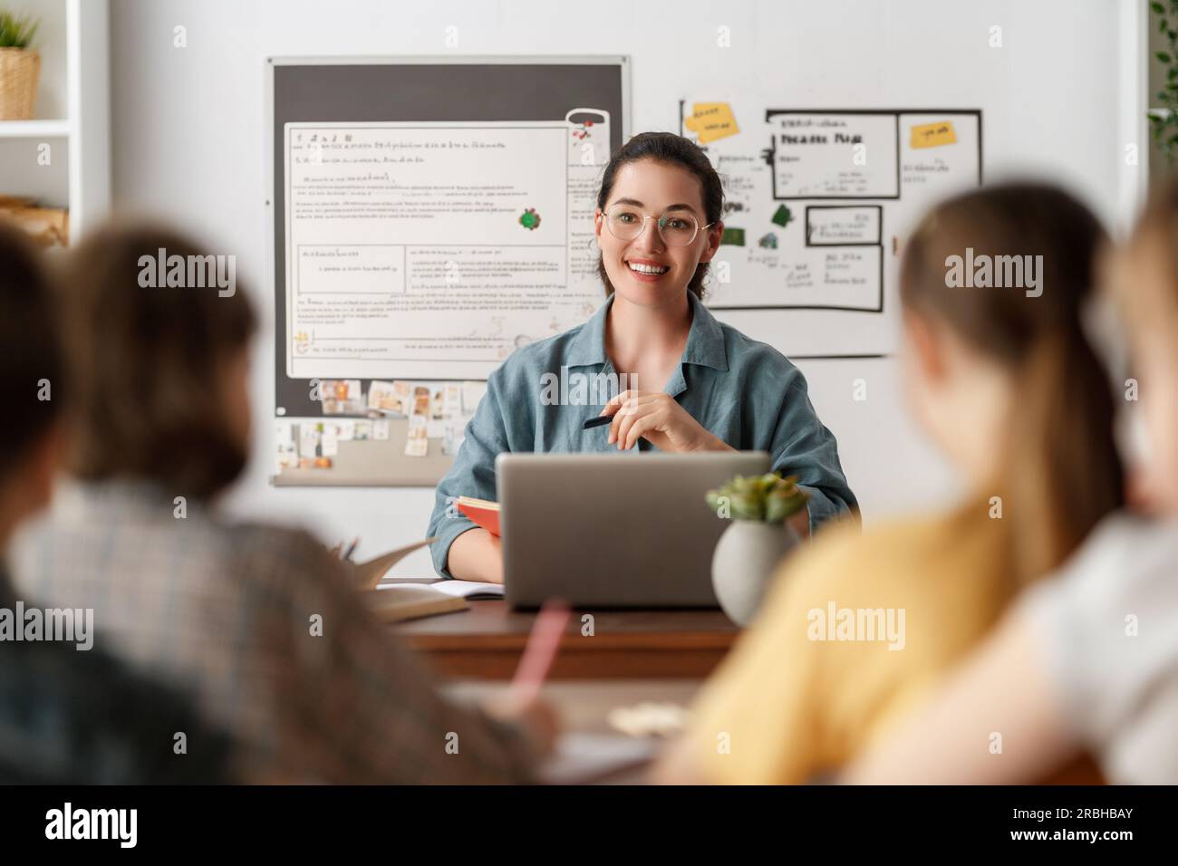 Children teacher school talking table hi-res stock photography and ...