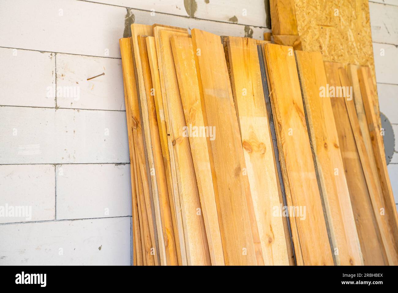Planed pine boards in stock. Building materials for construction Stock ...