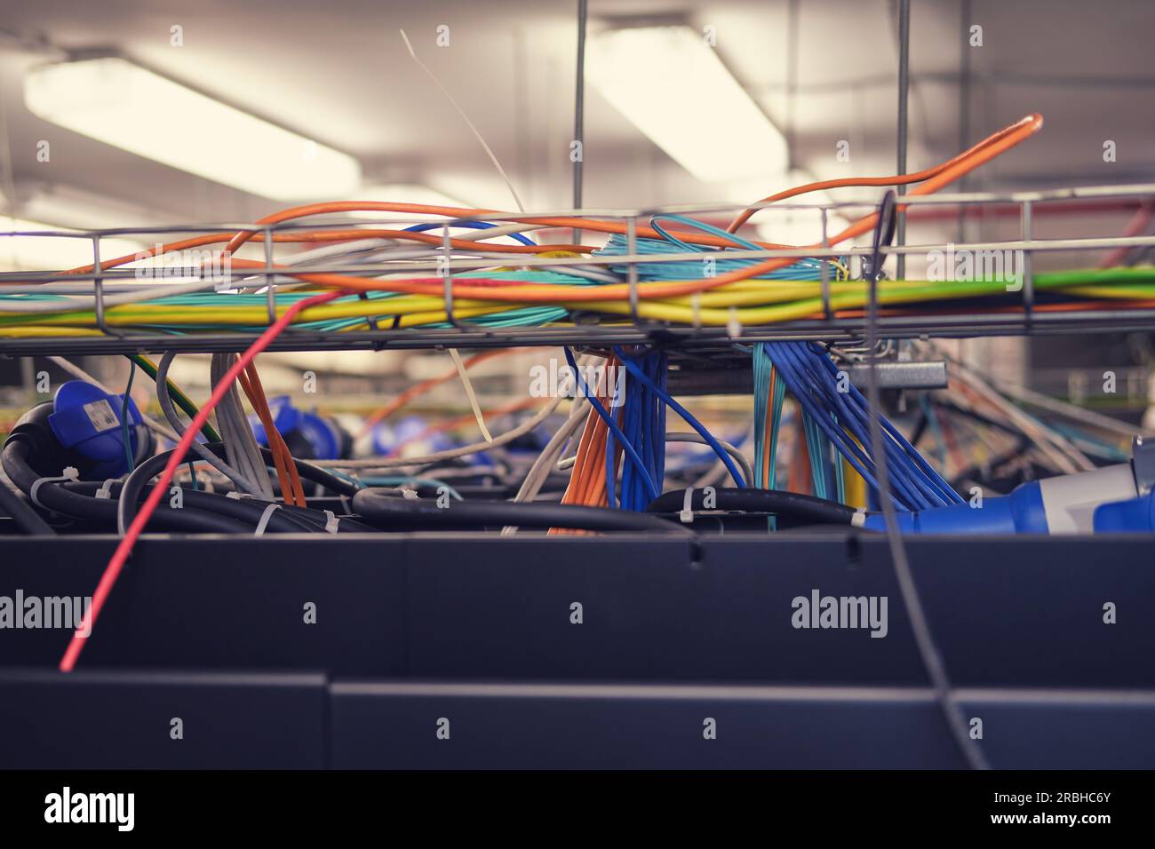 There are many wires running through the cable tray in the server room ...