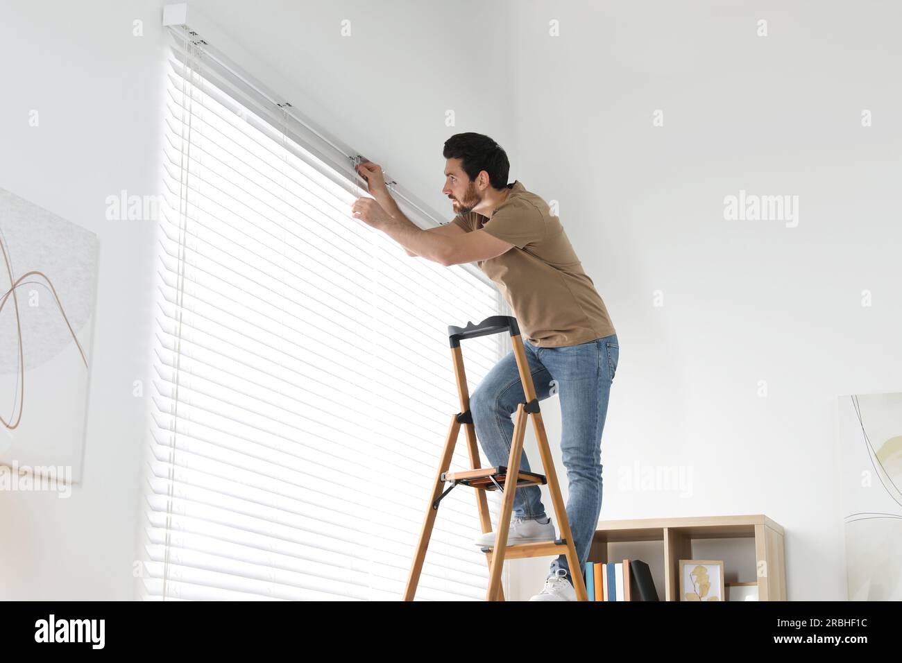 Installing blinds hi-res stock photography and images - Alamy