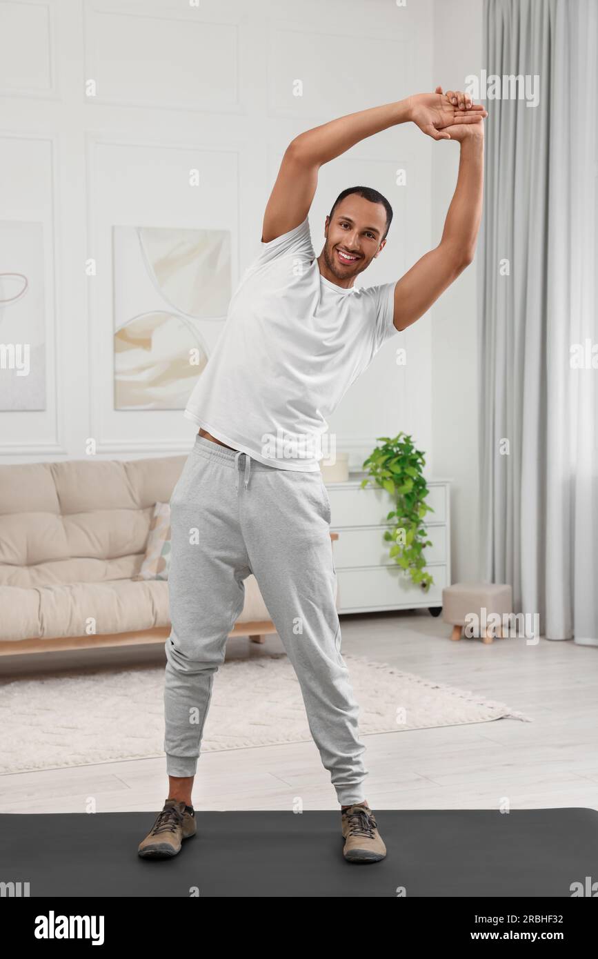 Young biracial man exercises hi-res stock photography and images - Alamy
