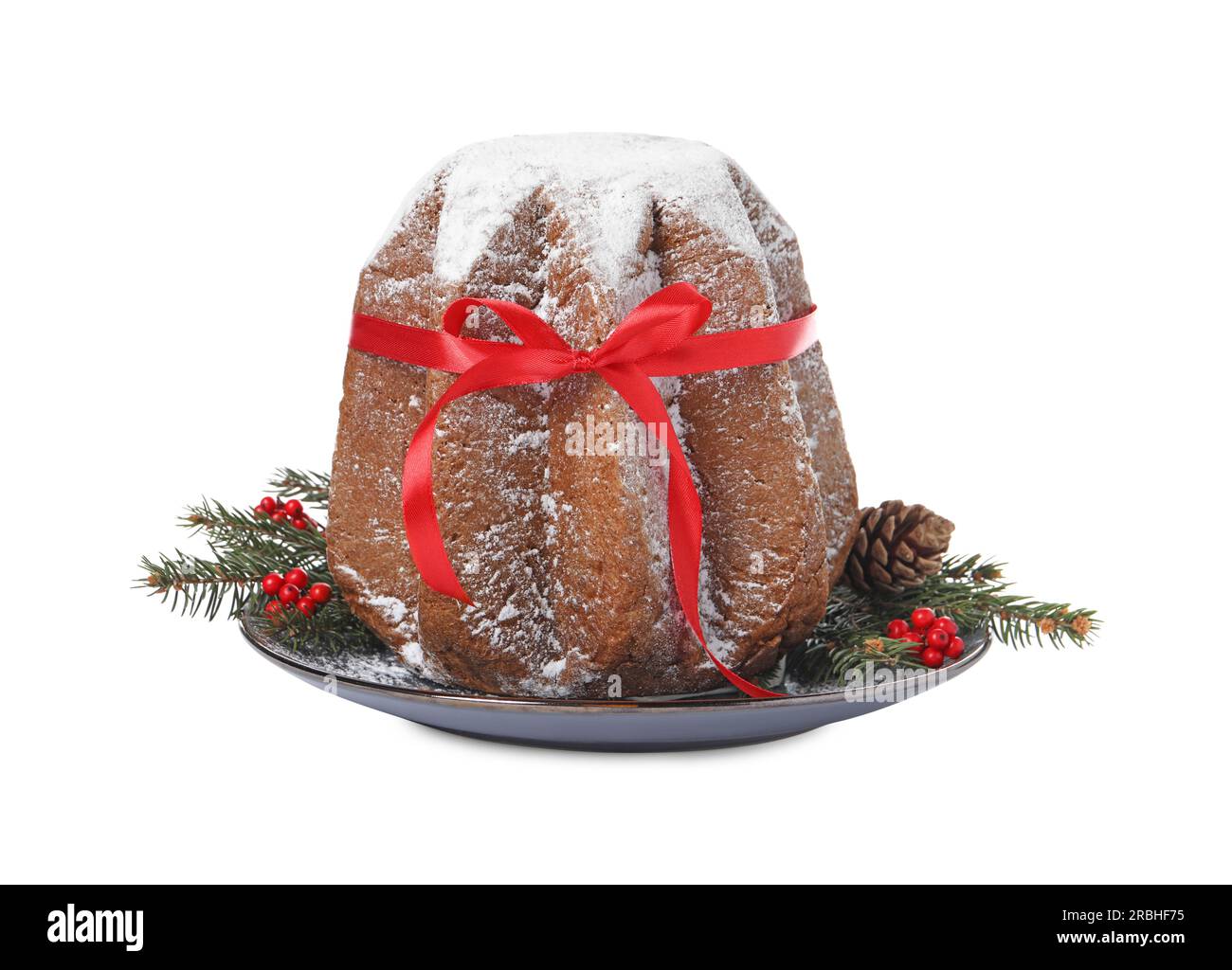 Delicious Pandoro cake with powdered sugar and red bow, Christmas decor ...