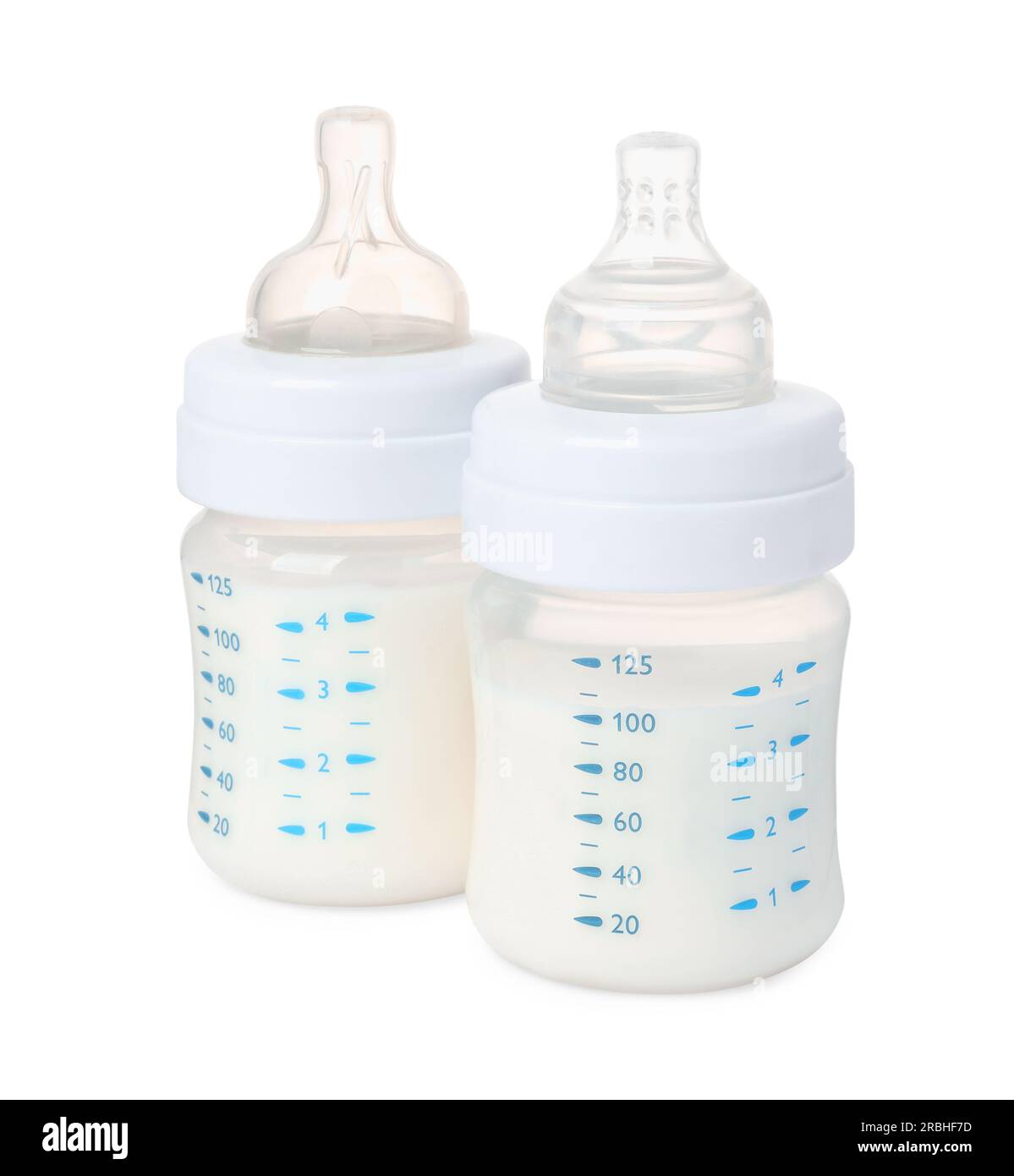 Two feeding bottles with infant formula on white background Stock Photo ...