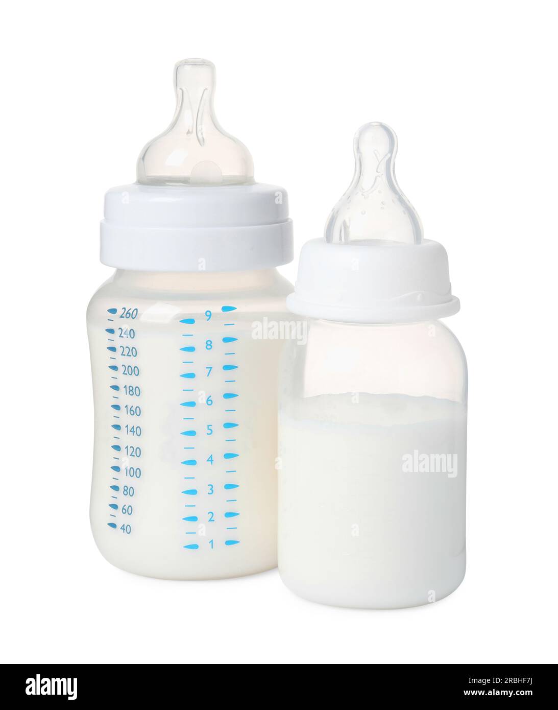 Two feeding bottles with infant formula on white background Stock Photo ...