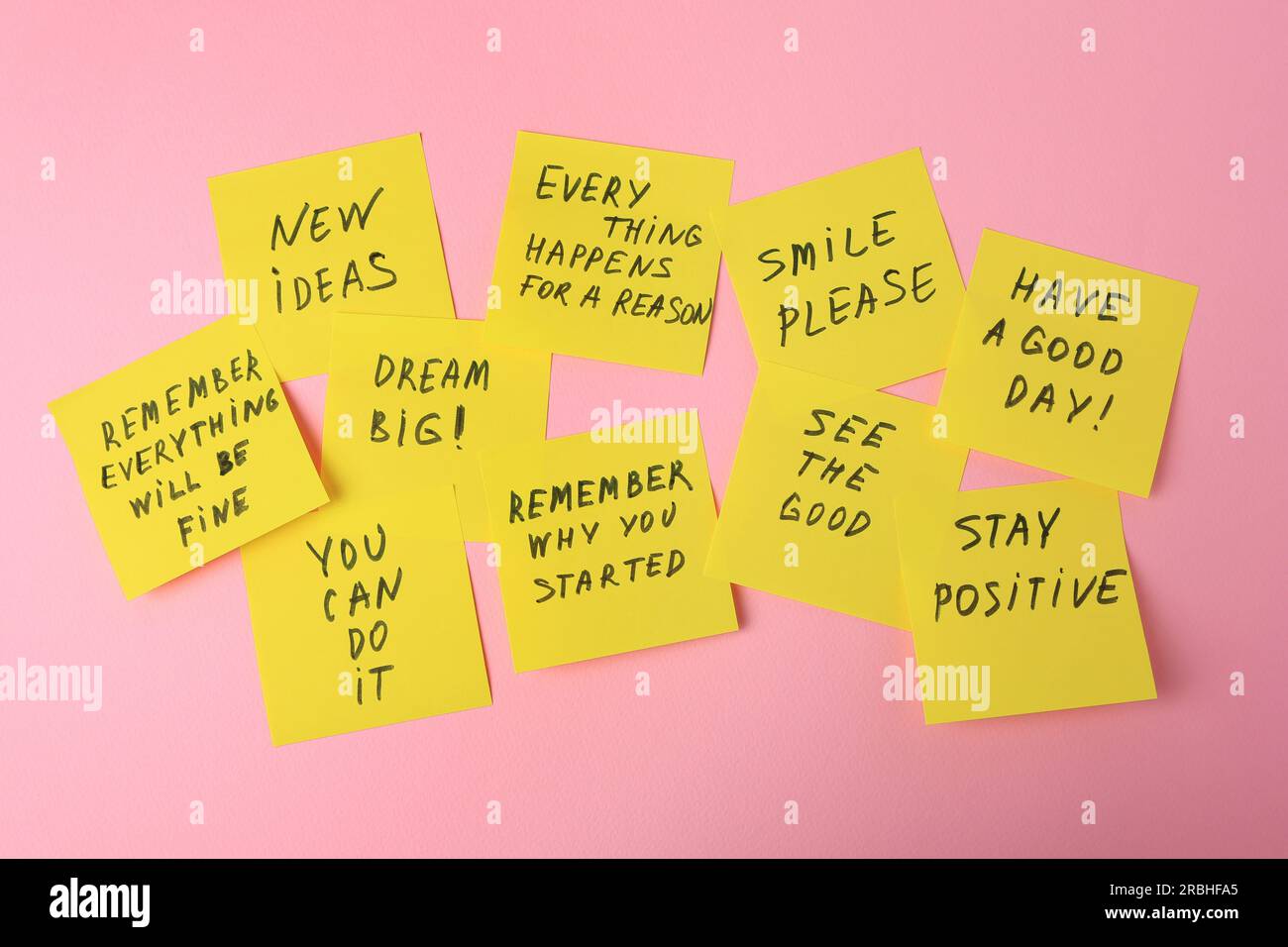 Paper notes with life-affirming phrases on pink background Stock Photo ...