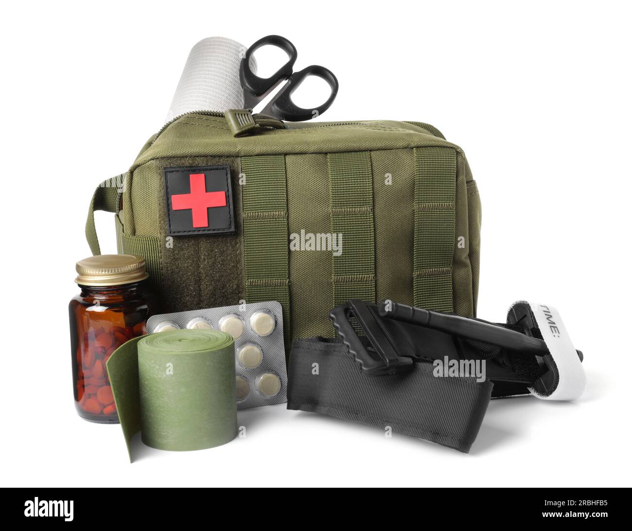 Military first aid kit, tourniquet, pills and tools on white background ...