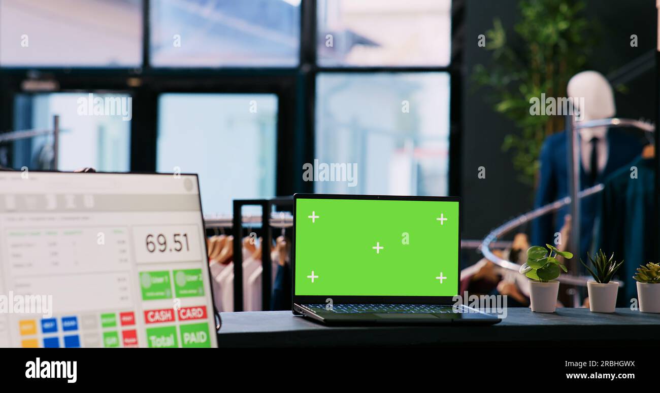 Laptop computer with chroma key green screen mock up display standing ...