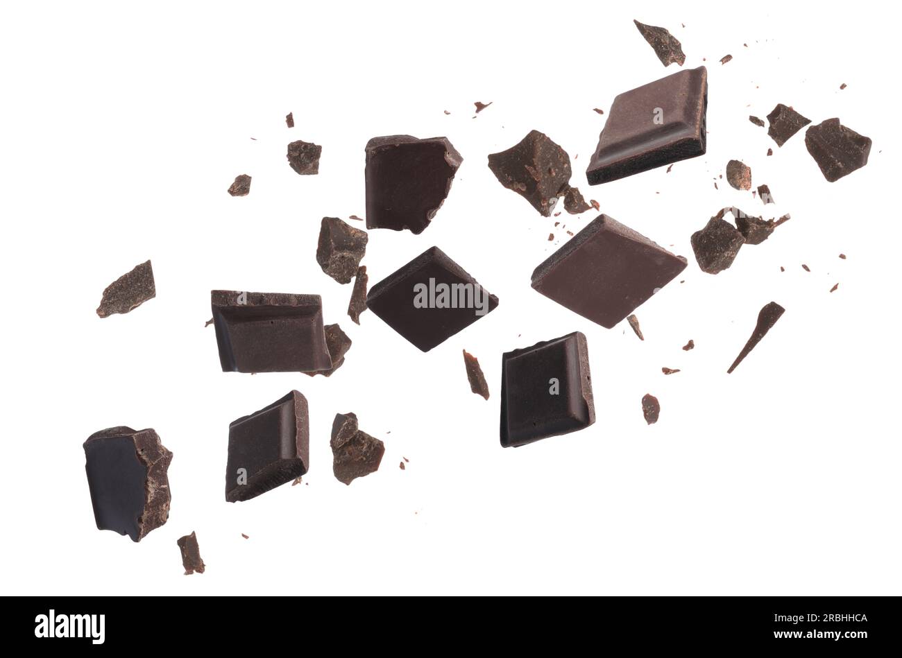 Pieces of chocolate bar falling on white background Stock Photo - Alamy
