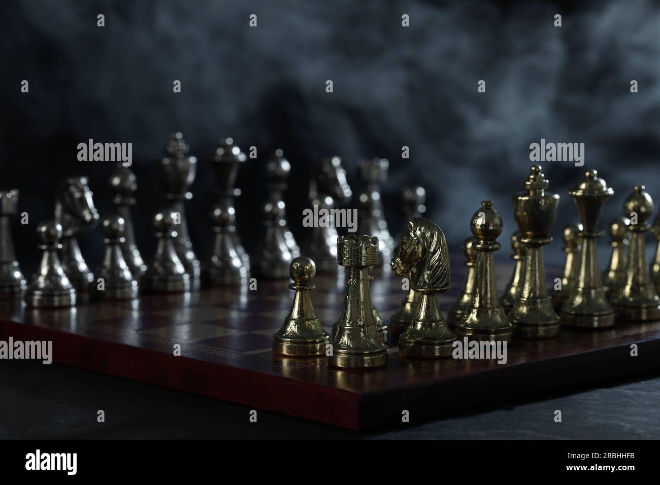 Set of chess pieces on checkerboard before game, selective focus Stock ...