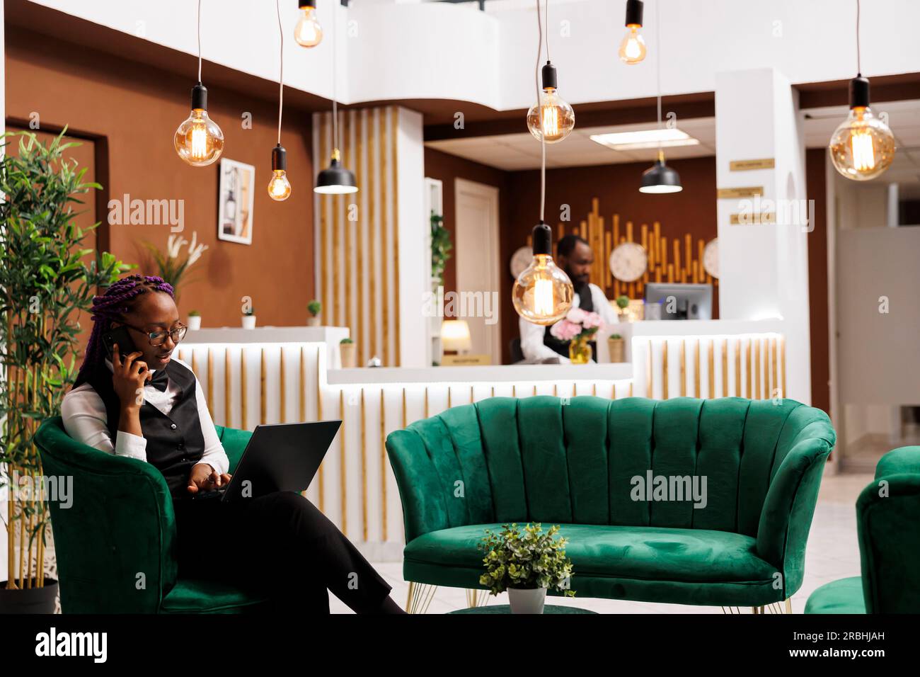 Hotel receptionist african american hi-res stock photography and images ...