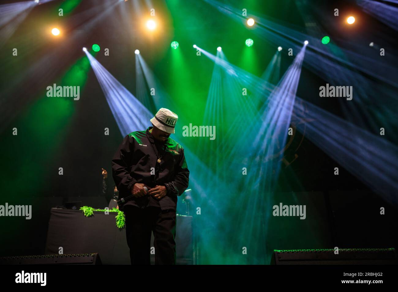 Sen Dog of Cypress Hill performs on stage sporting a bucket hat, a ...