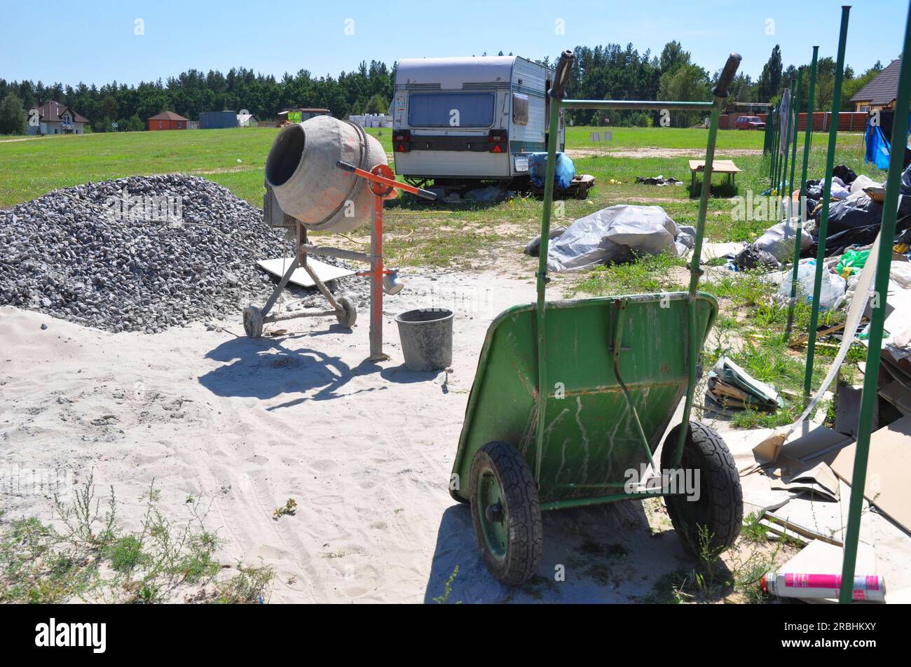 Close up on concrete mixer, cement mortar mixing with construction ...