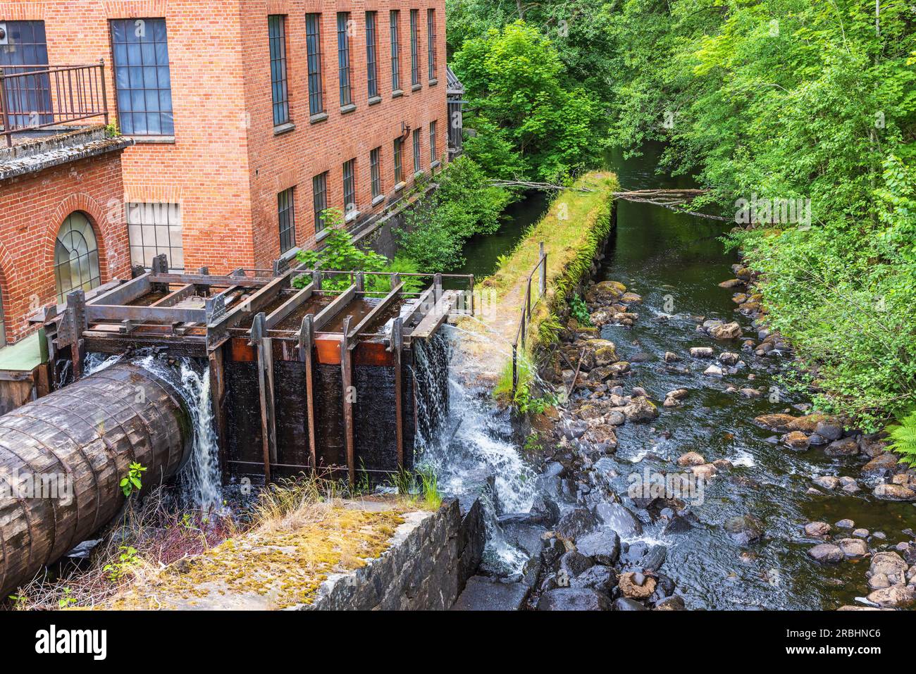 Old Hydropower plant by a river in the forest Stock Photo - Alamy