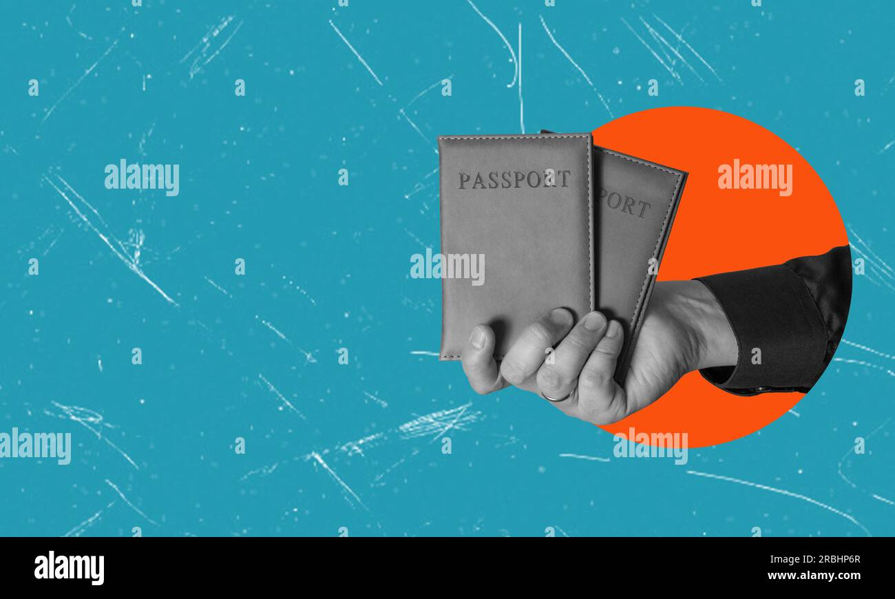 Art collage, hand with two passports on blue background with copying ...