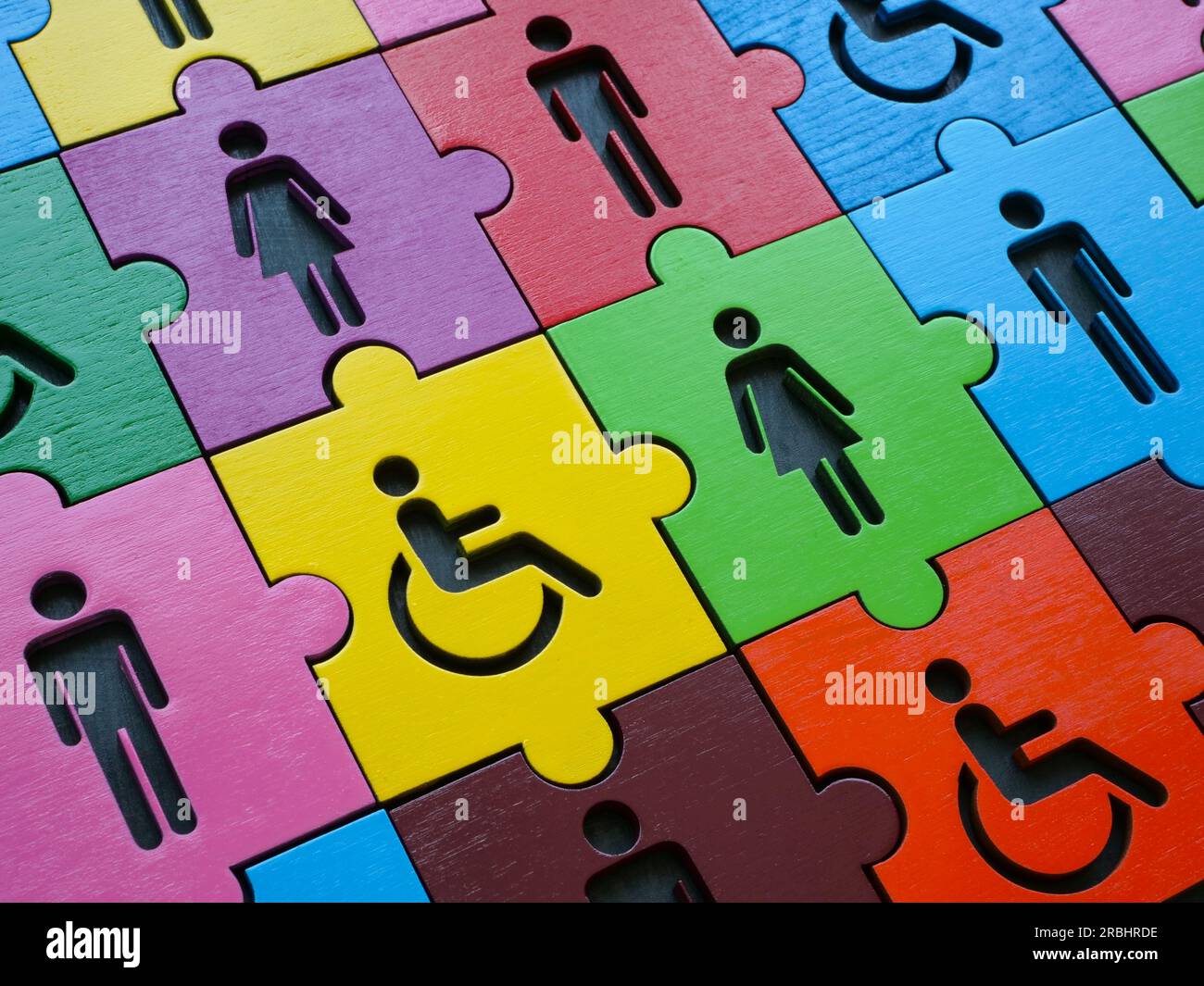 Diversity and inclusion. Multi-colored puzzle with figures of people ...