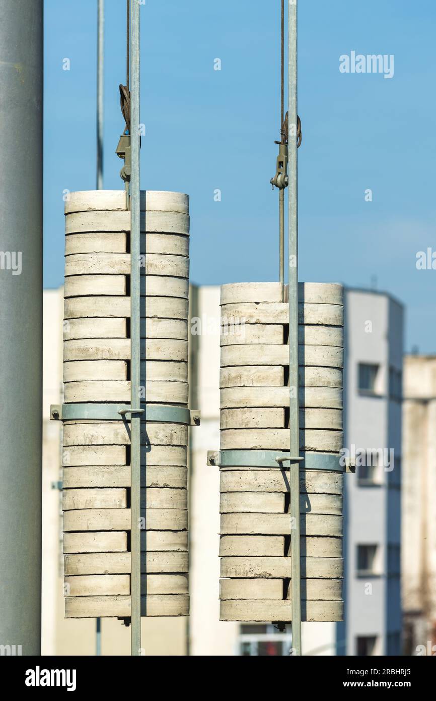 Electric train railway line tension pole with wires and concrete ...
