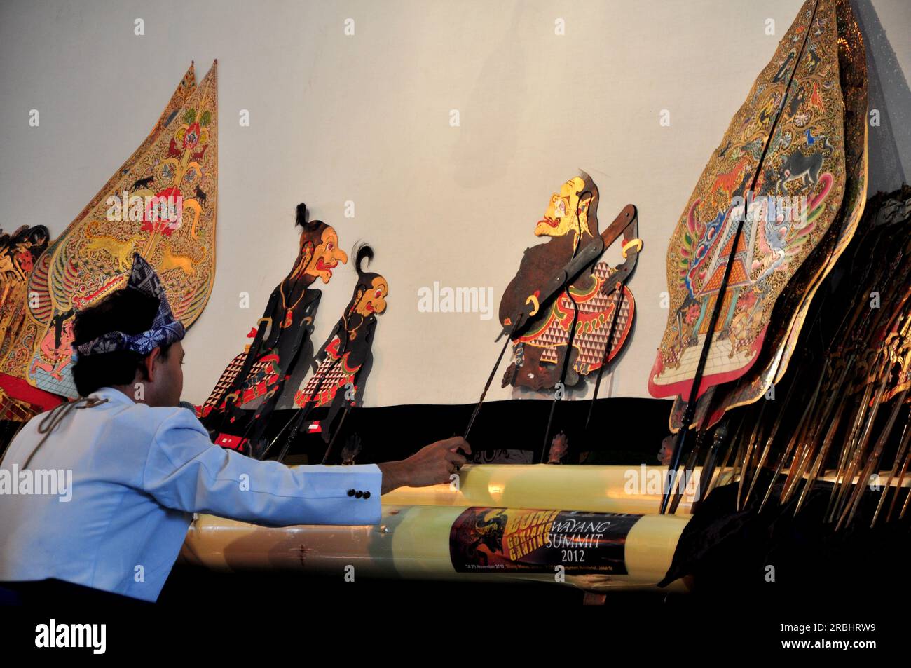 Jakarta, Indonesia - November 25, 2012 : A puppeteer is playing a ...