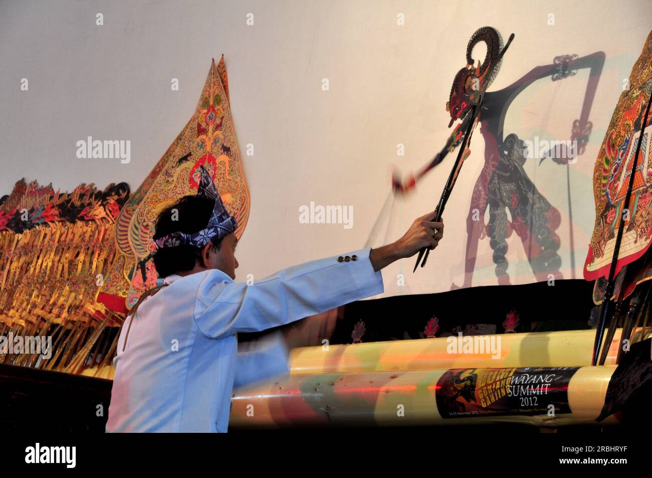 Jakarta, Indonesia - November 25, 2012 : A puppeteer is playing a ...