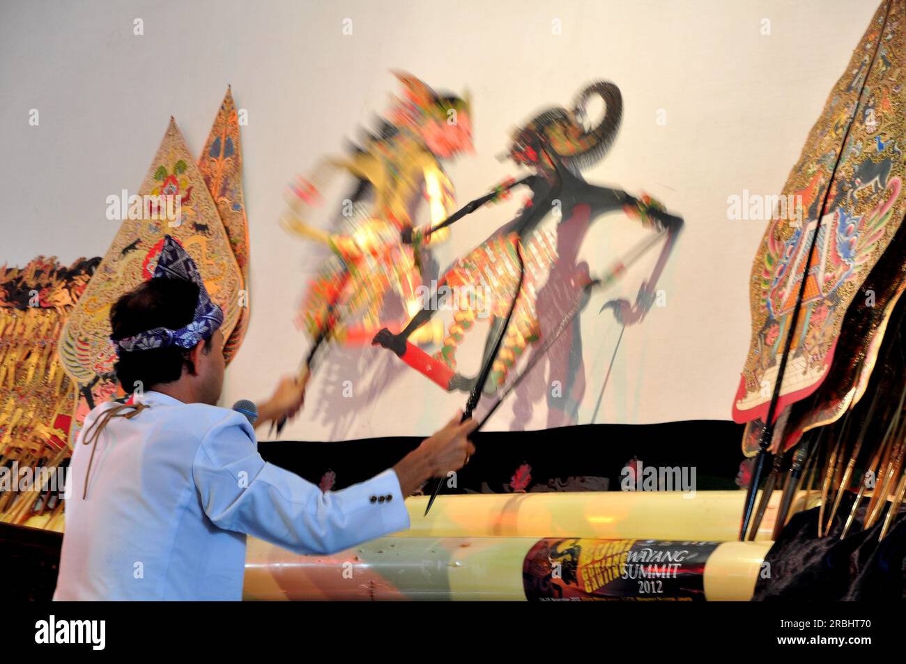 Jakarta, Indonesia - November 25, 2012 : A puppeteer is playing a ...
