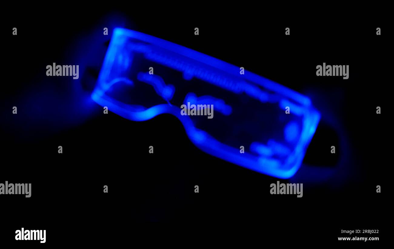 Defocus, blurred image of eyeware goggles colorful neon light ...