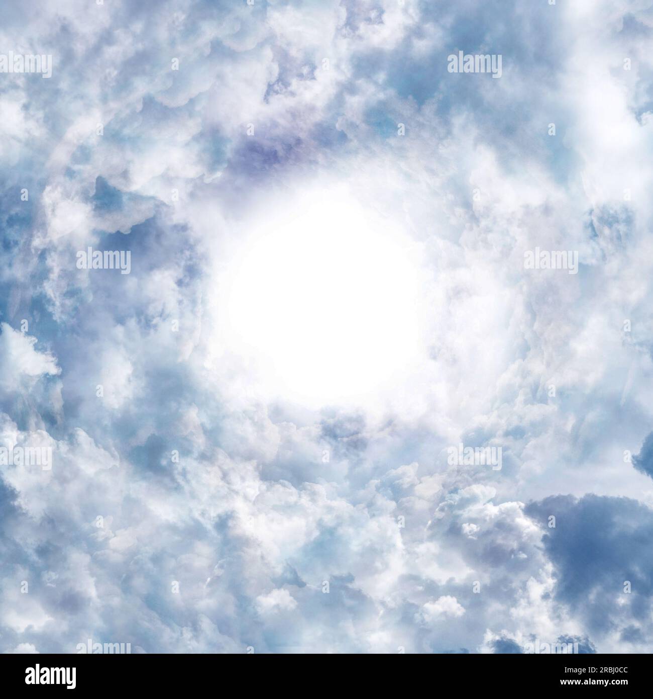 clouds forming a tunnel in the sky with a bright center Stock Photo - Alamy